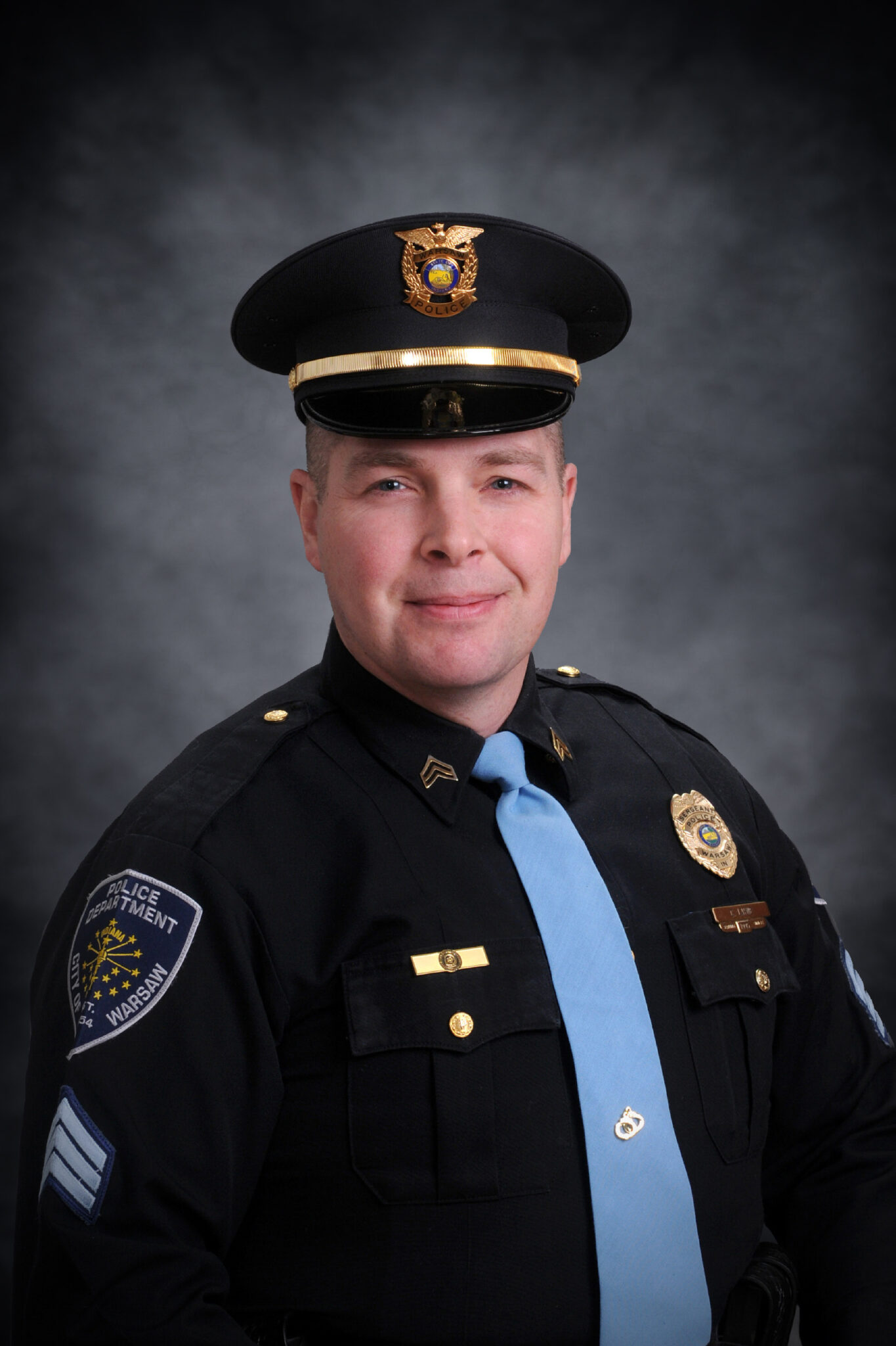 Three Warsaw police officers promoted - News Now Warsaw